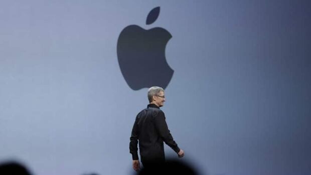 Apple Stocks Surge Though Earnings Fall Cbc News