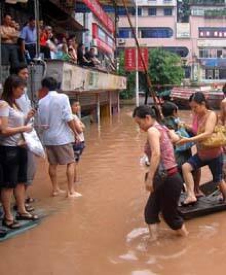 Floods, landslides kill 94 in China | CBC News Floods, landslides kill 94 in China | CBC News
